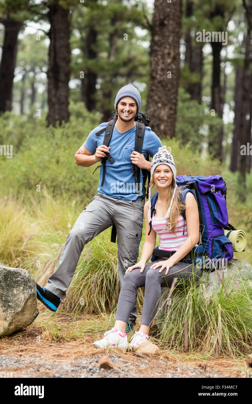 Portrait of a young smiling hiker couple Stock Photo - Alamy