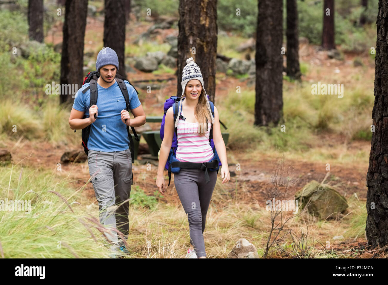 Young happy hiker couple hiking Stock Photo - Alamy