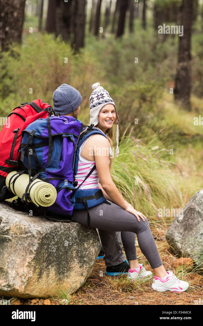 Portrait of a young happy hiker with friend Stock Photo - Alamy