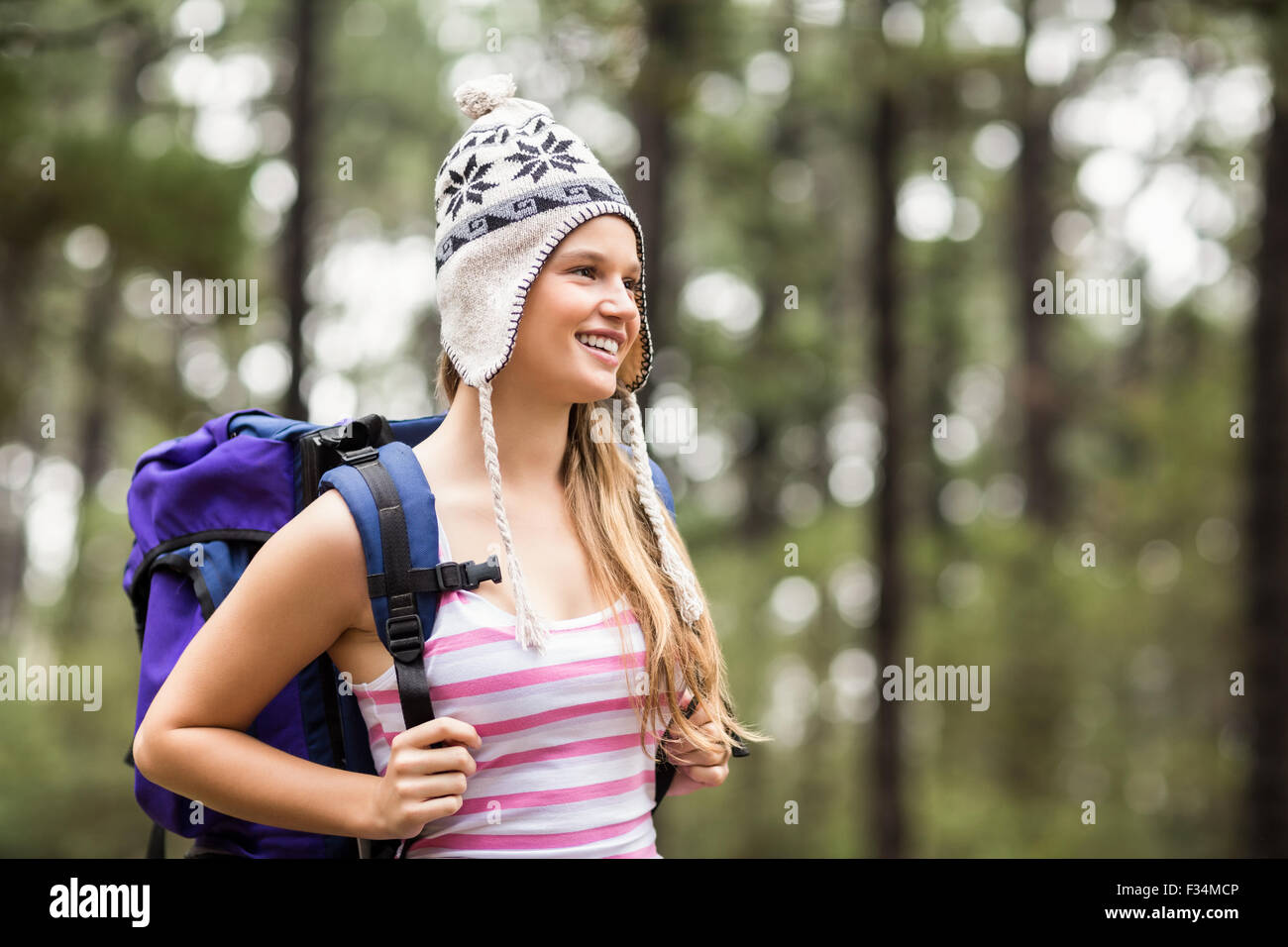 Young happy hiker looking in the distance Stock Photo - Alamy