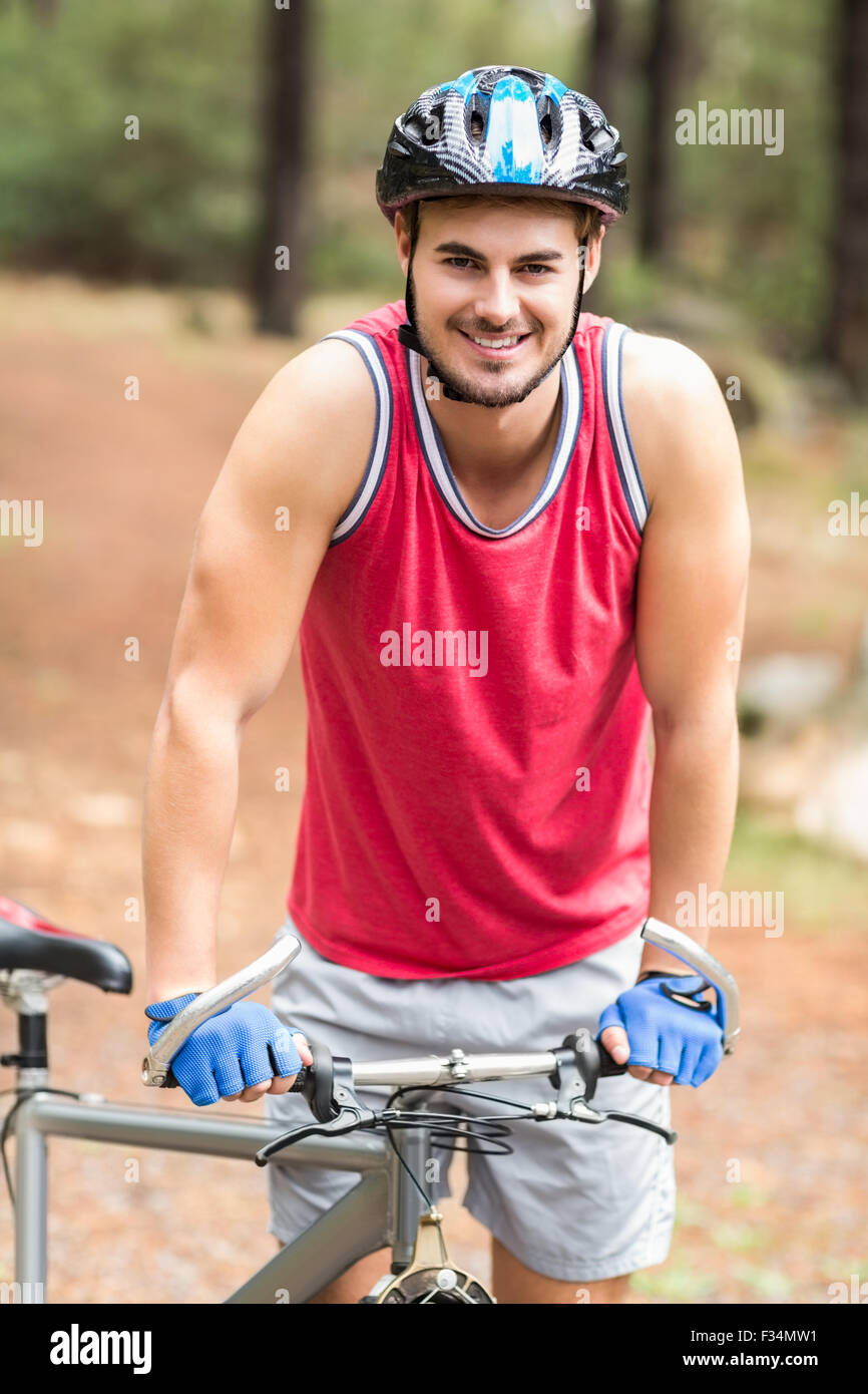 Handsome young biker looking at camera Stock Photo - Alamy