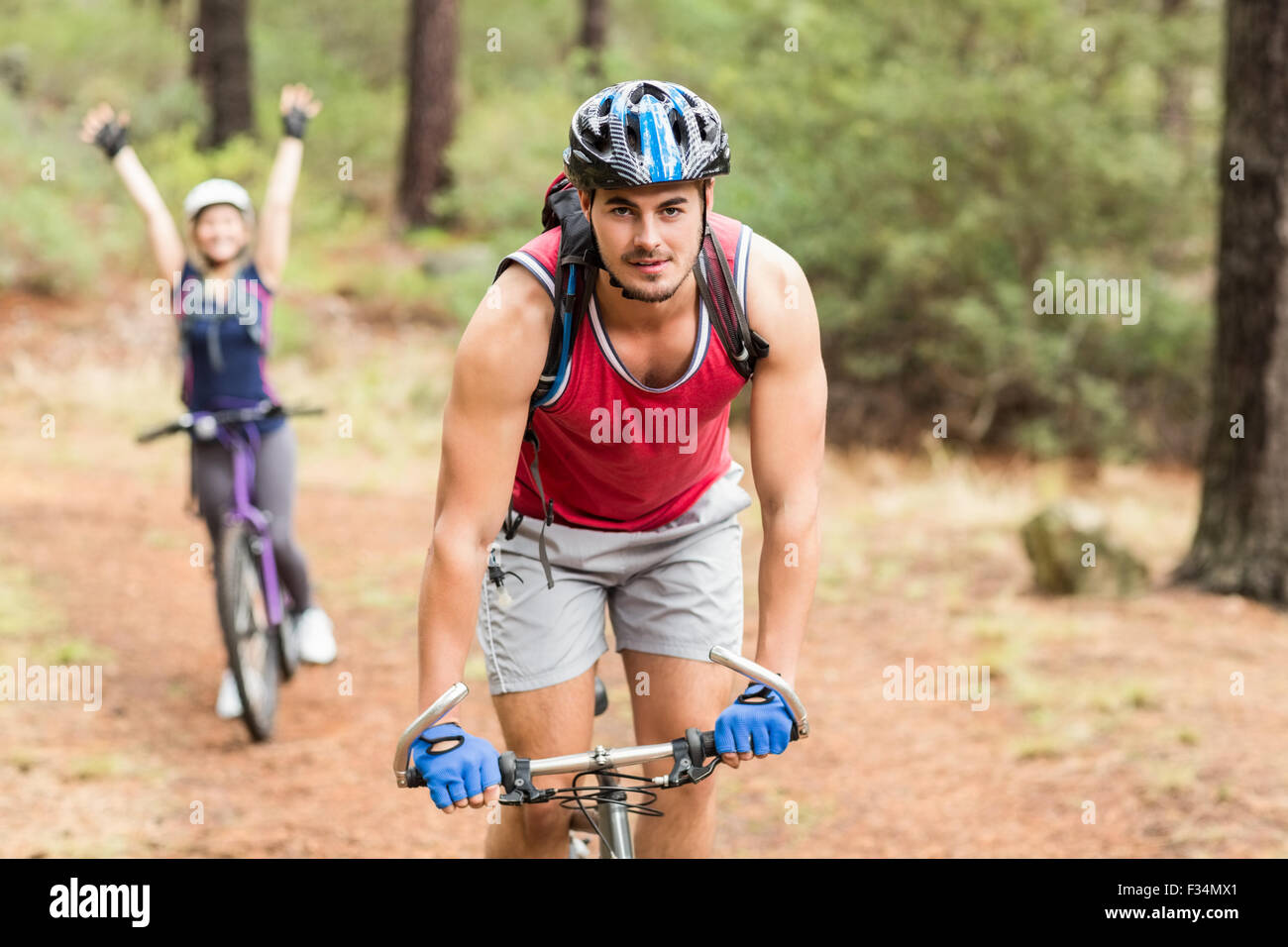 Handsome biker looking at the camera Stock Photo - Alamy