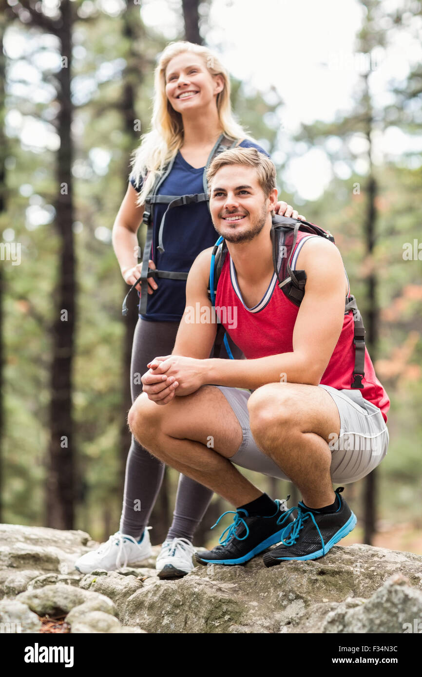 Young happy hiker couple looking away Stock Photo - Alamy