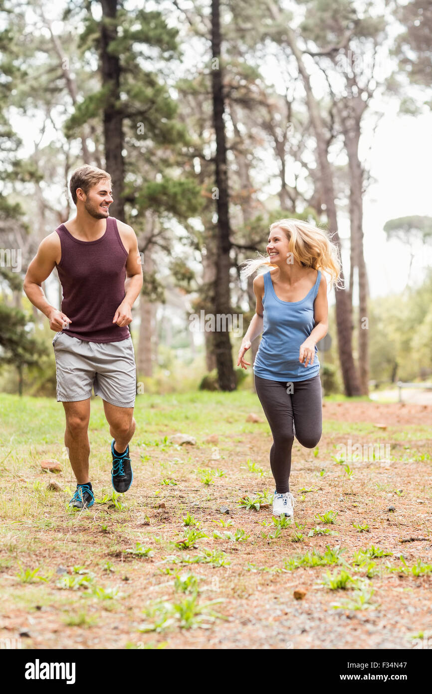 Young happy joggers running Stock Photo - Alamy