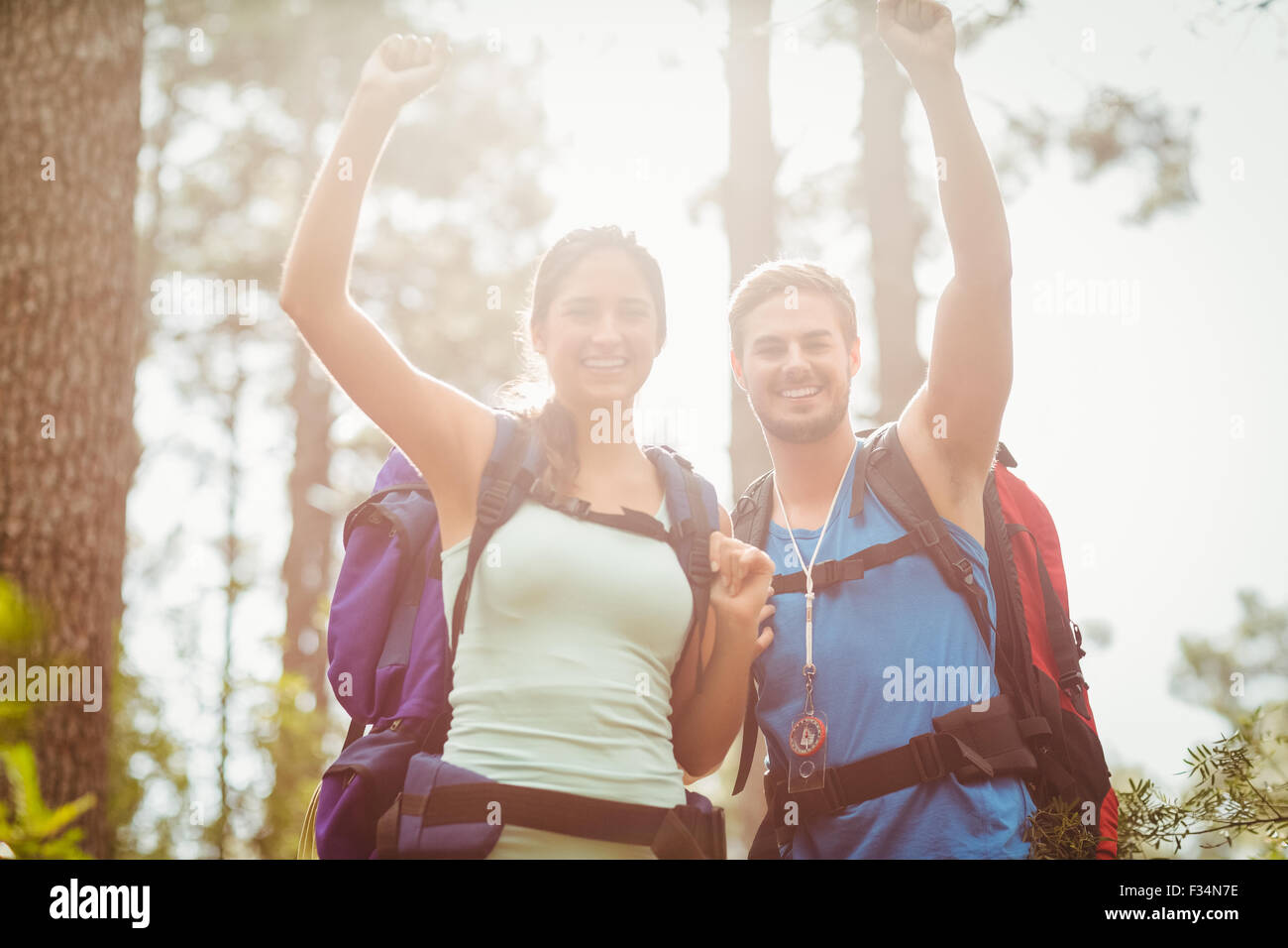 Happy hikers cheering Stock Photo - Alamy