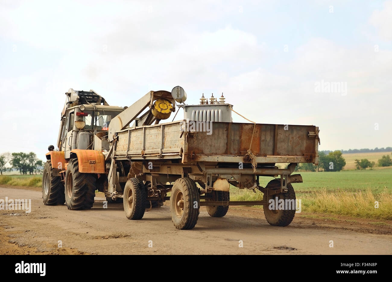 Old red tractor trailer in hi-res stock photography and images - Alamy