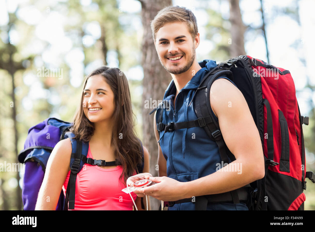 Young happy joggers looking at camera Stock Photo - Alamy