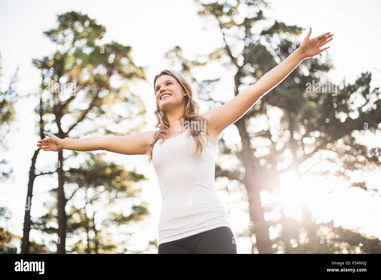 Young happy jogger cheering Stock Photo - Alamy