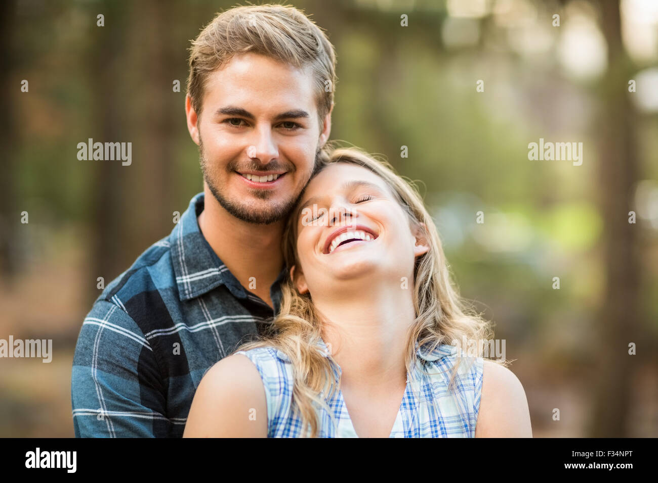 Happy smiling couple embracing Stock Photo - Alamy
