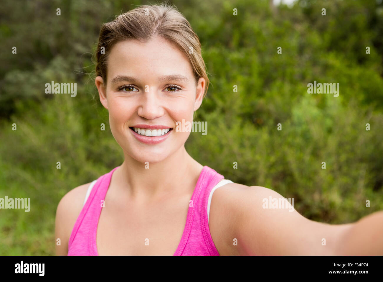 Smiling female athlete taking hi-res stock photography and images - Alamy