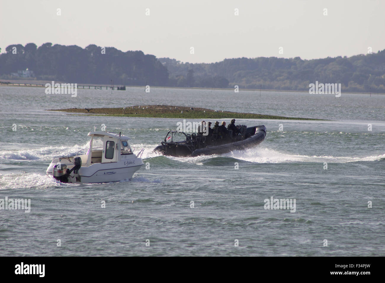 Poole, UK. 29th September 2015. Onlookers watch Special Boat services ...
