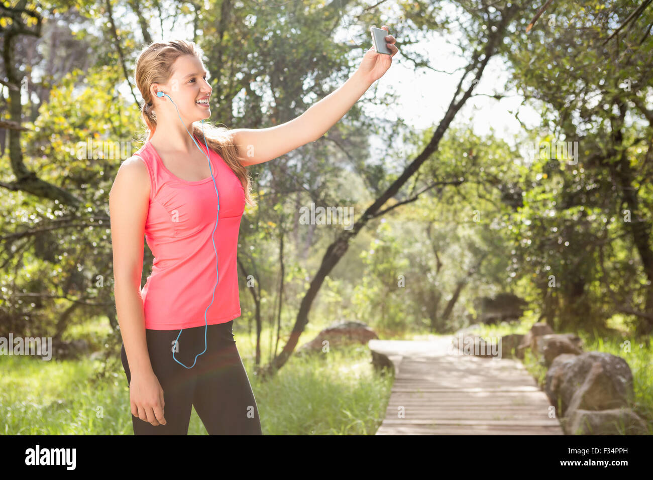 Smiling female athlete taking hi-res stock photography and images - Alamy