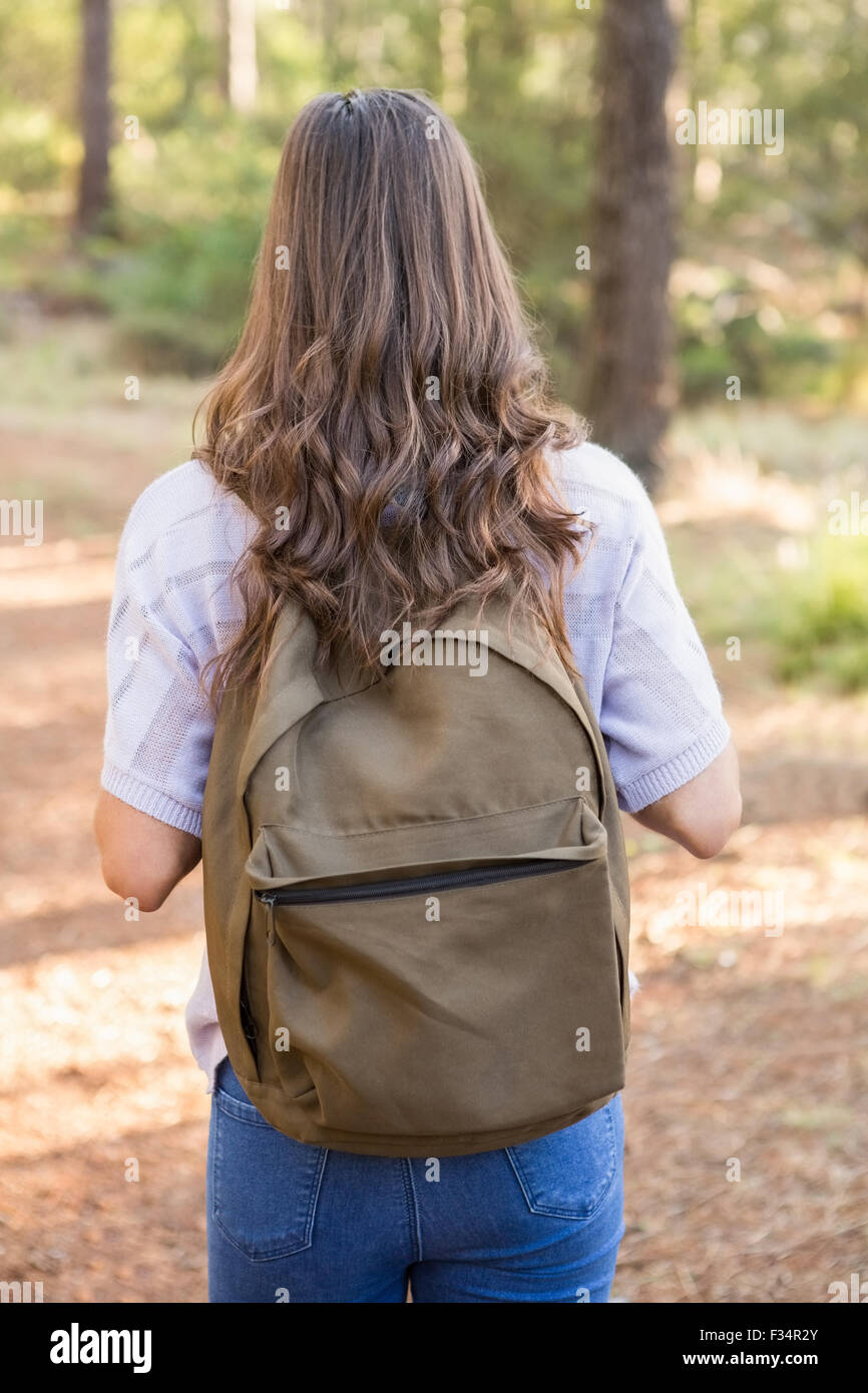 Brunette hiker hiking on path Stock Photo - Alamy