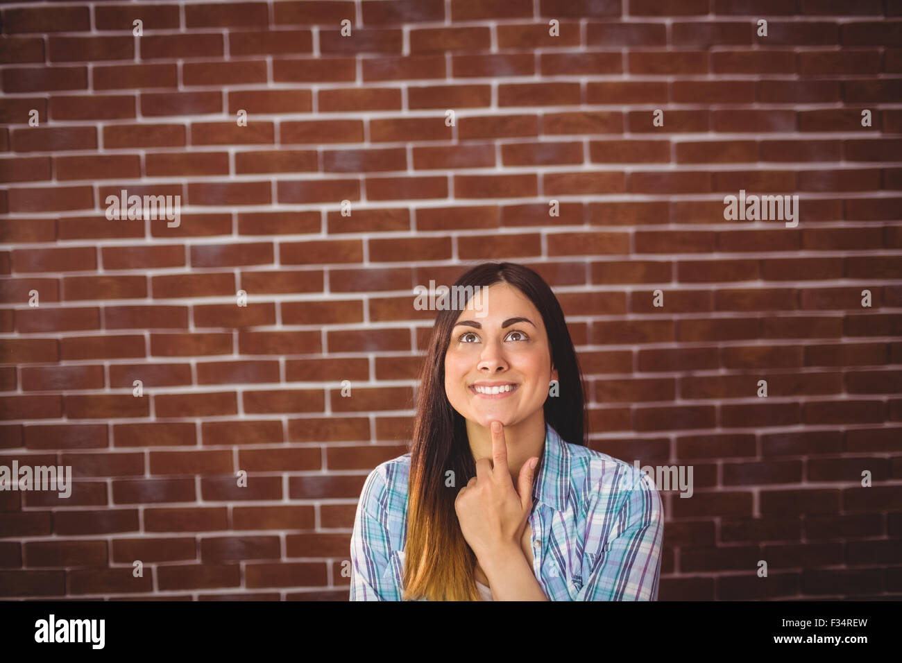 Smiling and thinking hi-res stock photography and images - Alamy