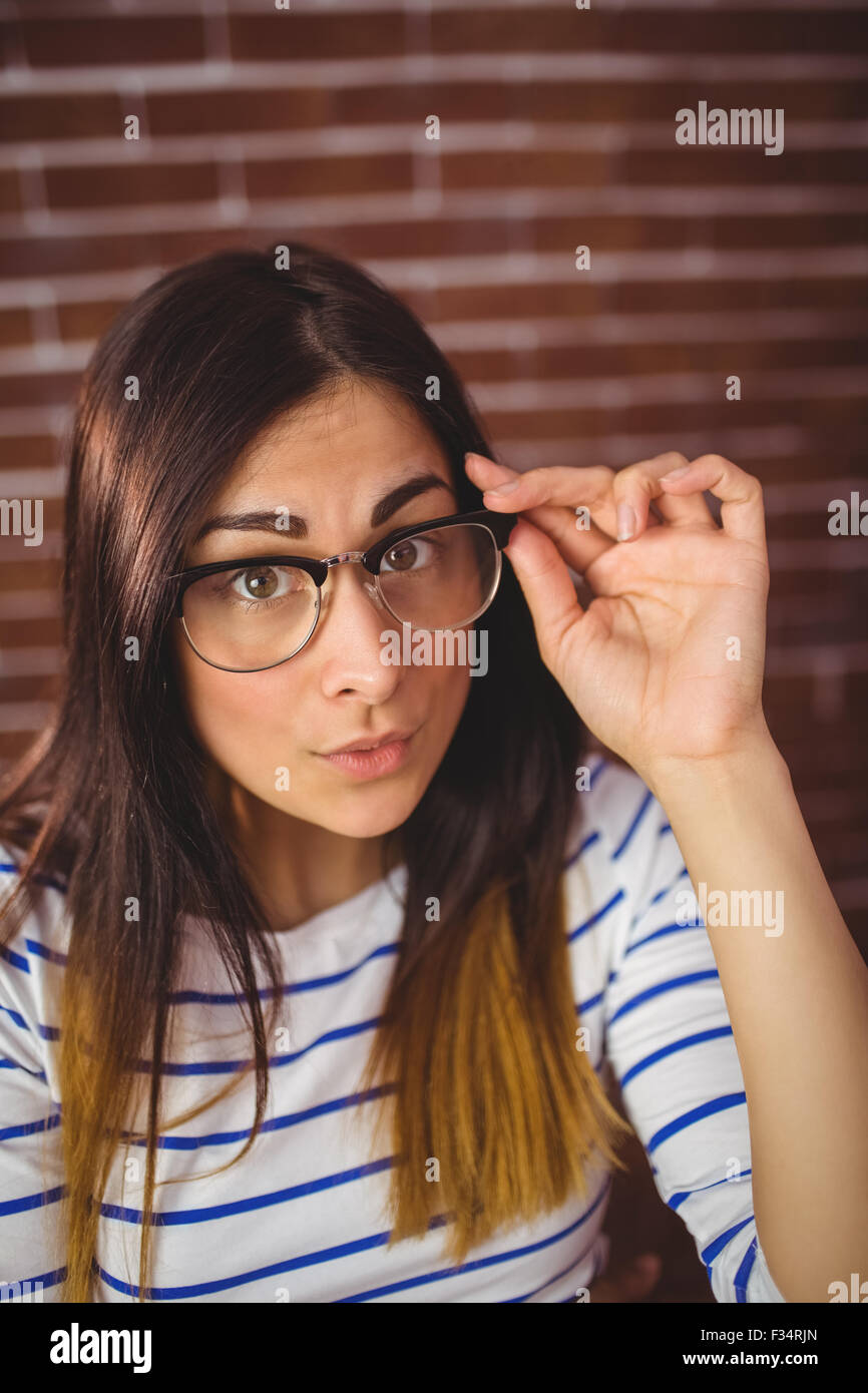 Pretty hipster posing for camera Stock Photo - Alamy