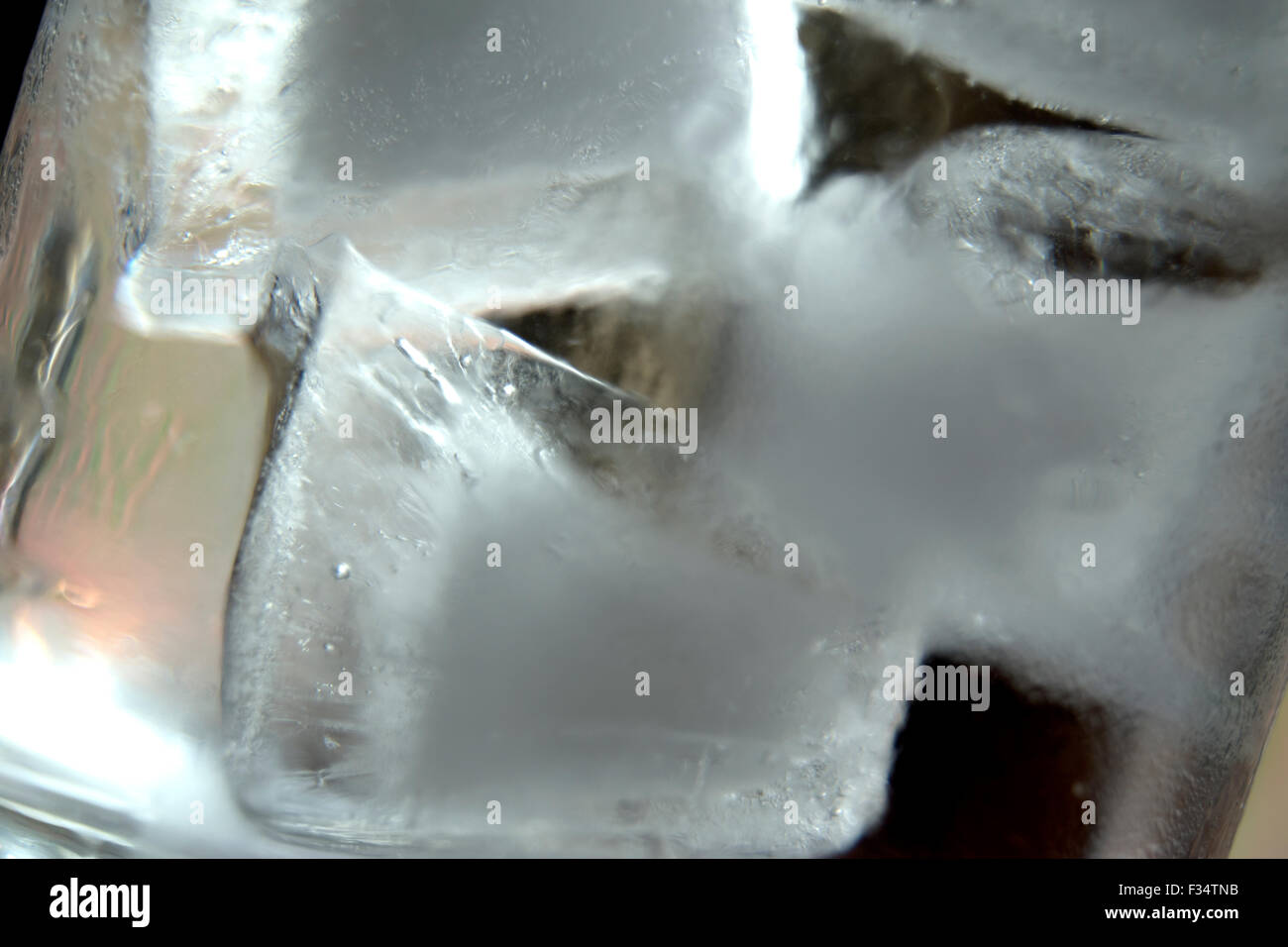 vodka and ice cubes in clear glass Stock Photo - Alamy