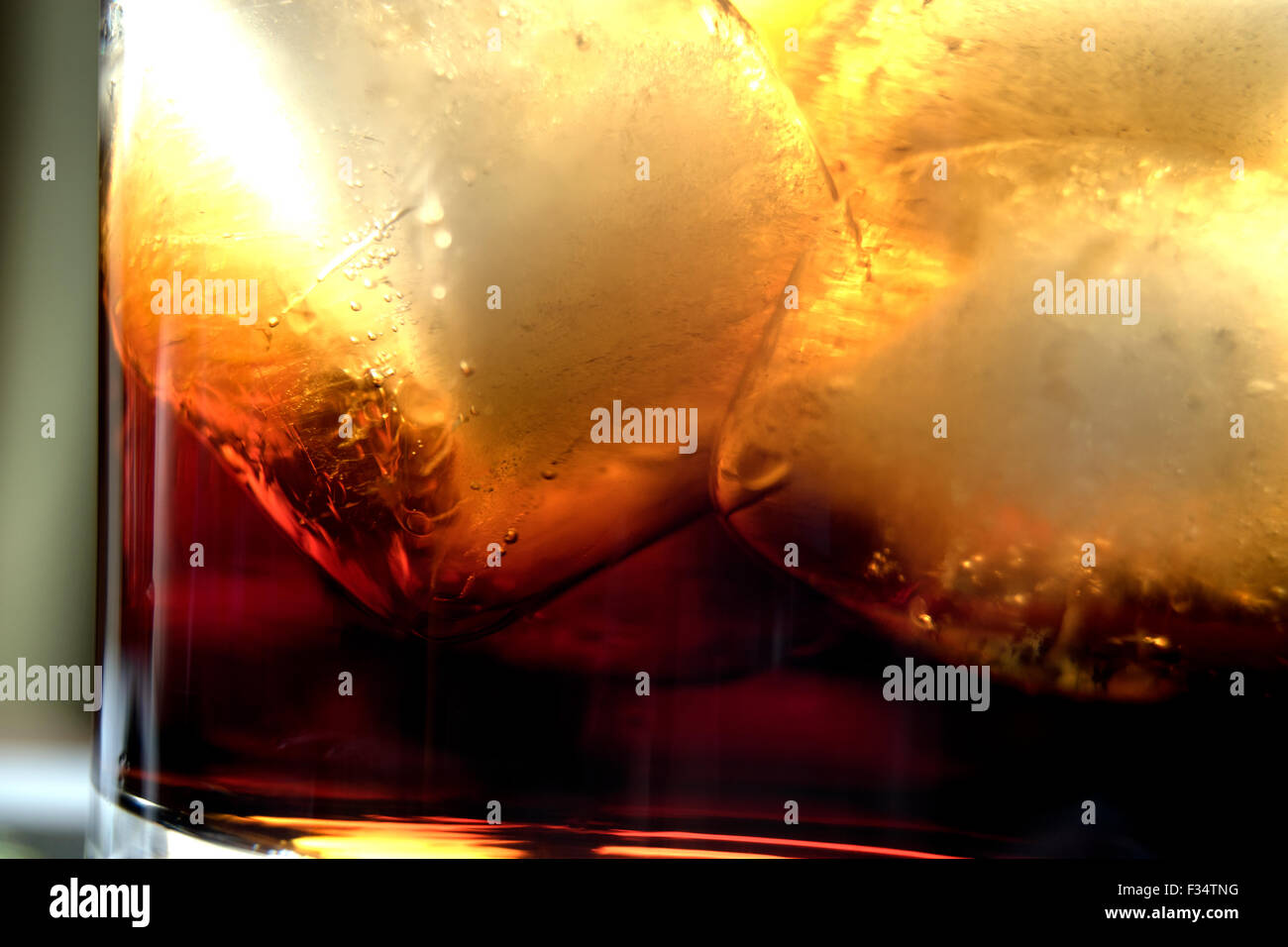 vodka, rum and ice in clear glass Stock Photo - Alamy