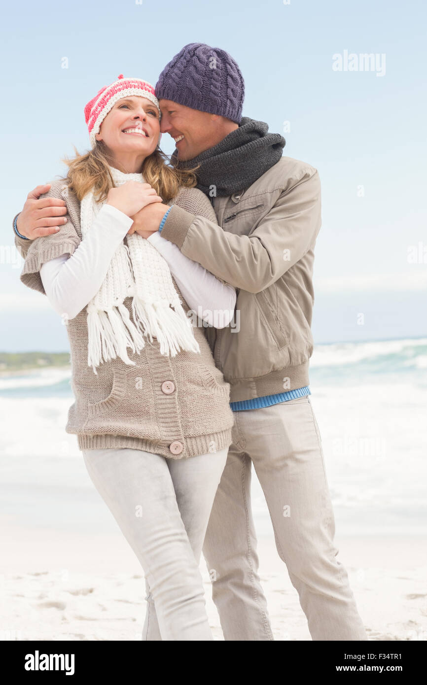 Happy couple holding each other Stock Photo - Alamy