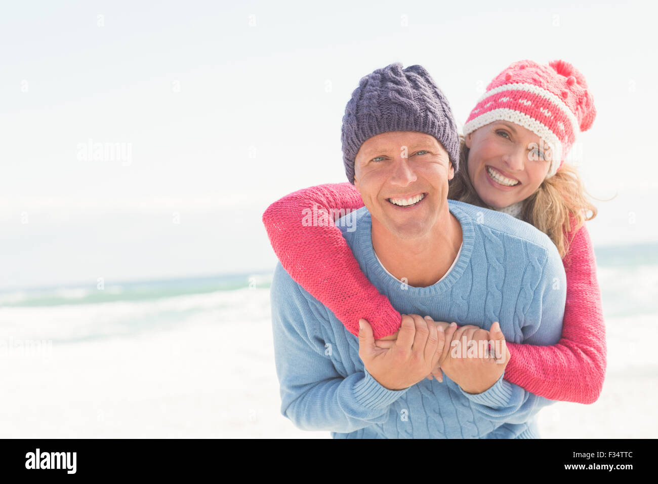 Smiling happy couple hugging each other Stock Photo - Alamy