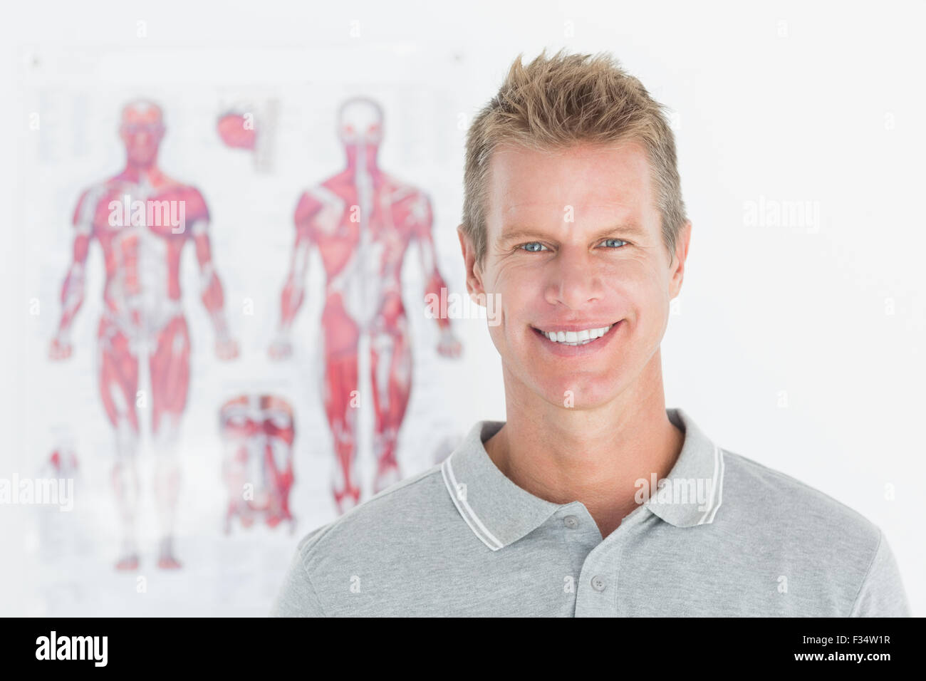 Happy male doctor looking camera hi-res stock photography and images ...