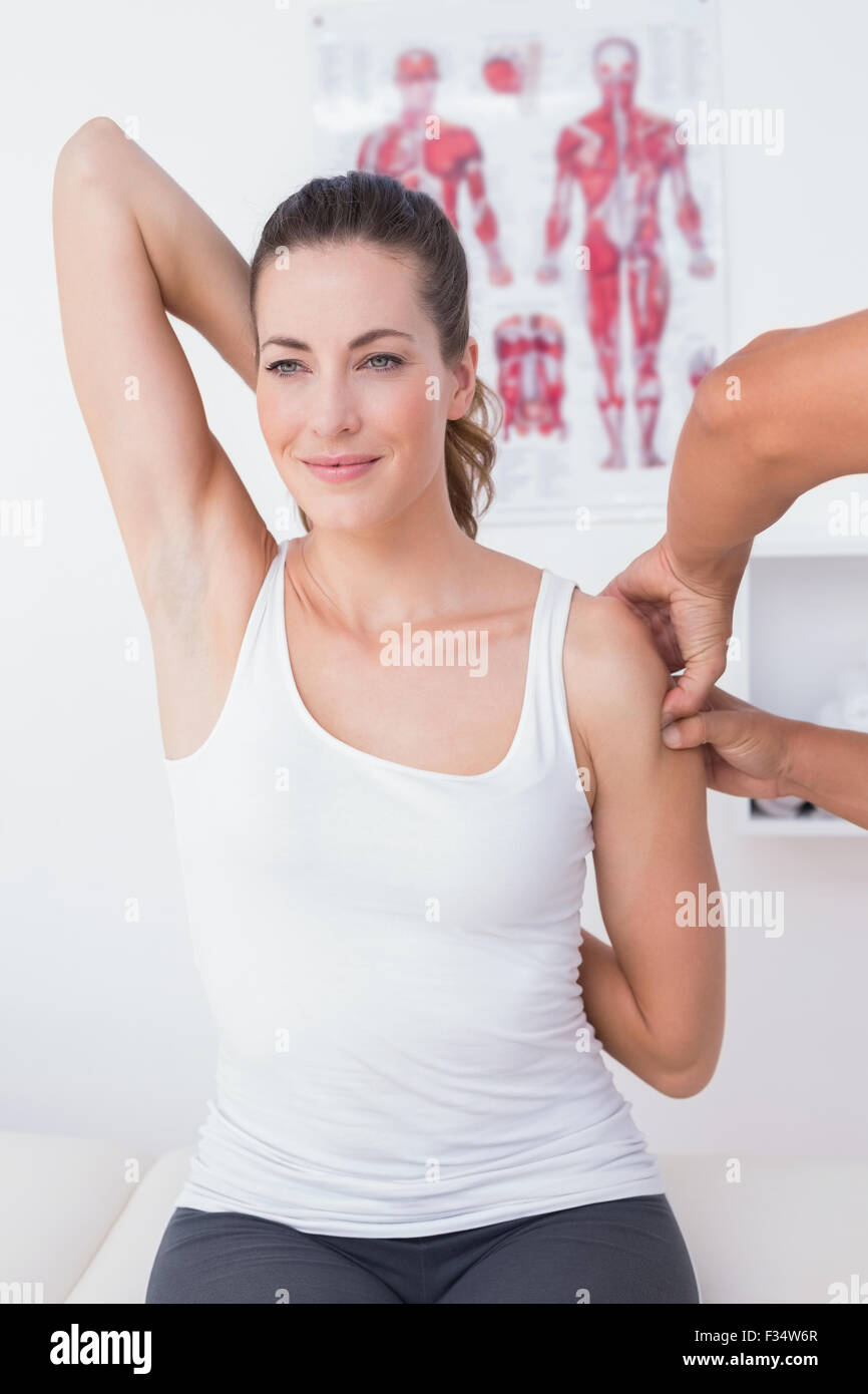Doctor examining his patient arm Stock Photo - Alamy