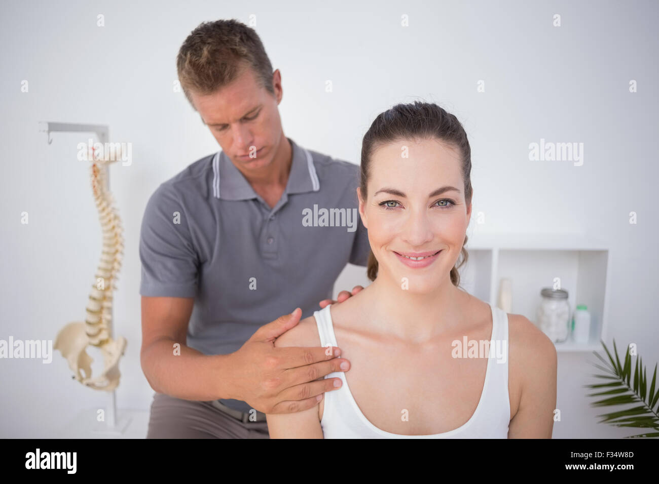 Doctor examining his patient arm Stock Photo - Alamy