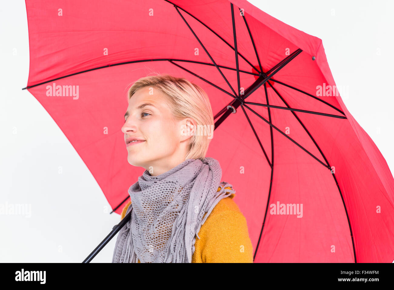 Happy woman keeping dry Stock Photo - Alamy