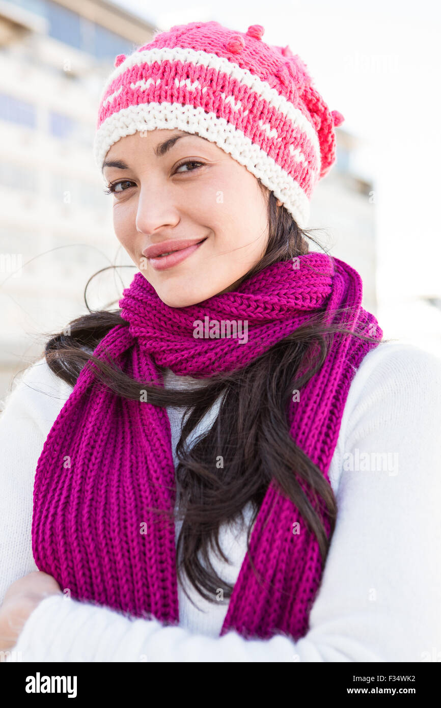Happy woman looking around Stock Photo - Alamy
