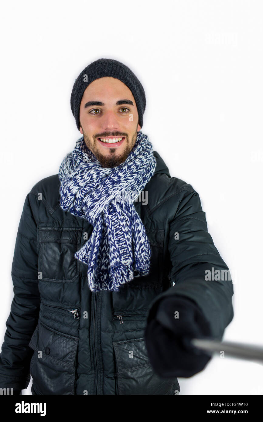 Bearded man using a selfie stick Stock Photo - Alamy