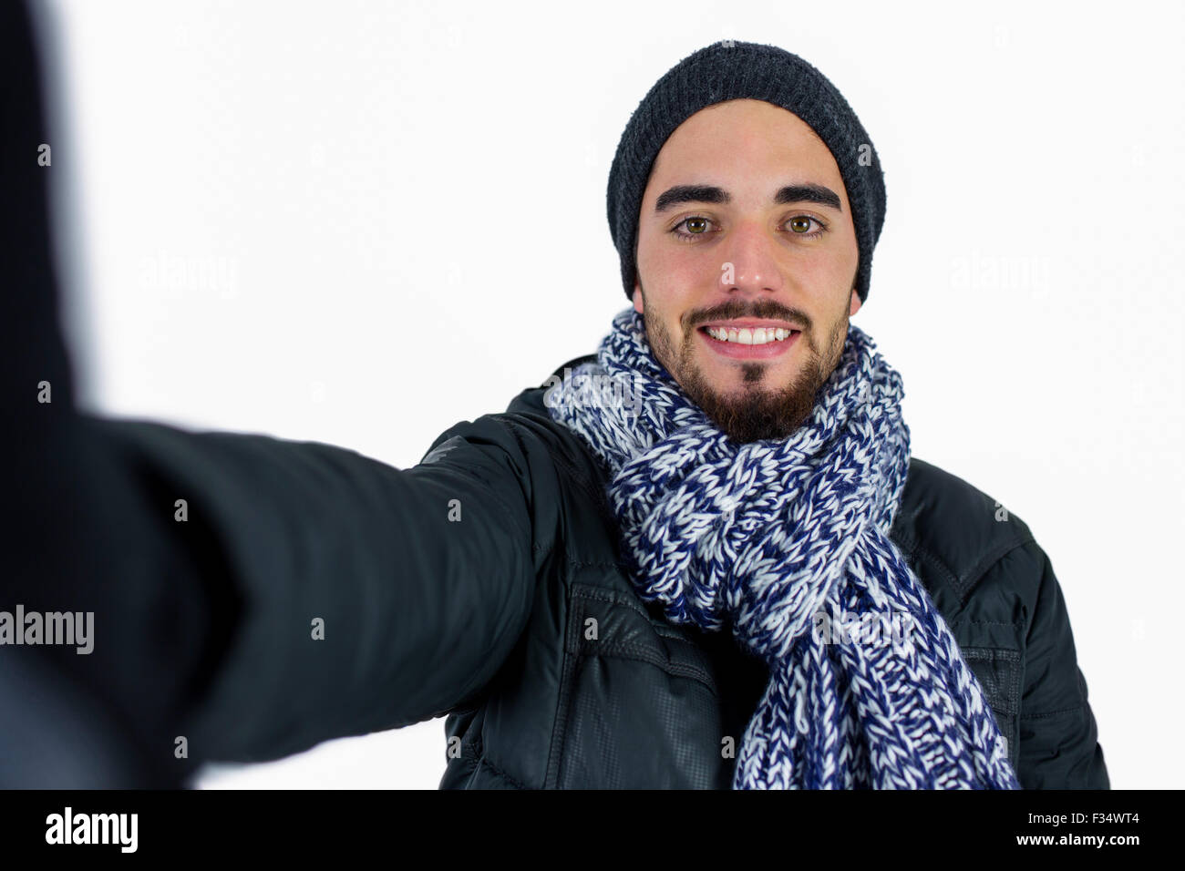 Bearded man using a selfie stick Stock Photo - Alamy
