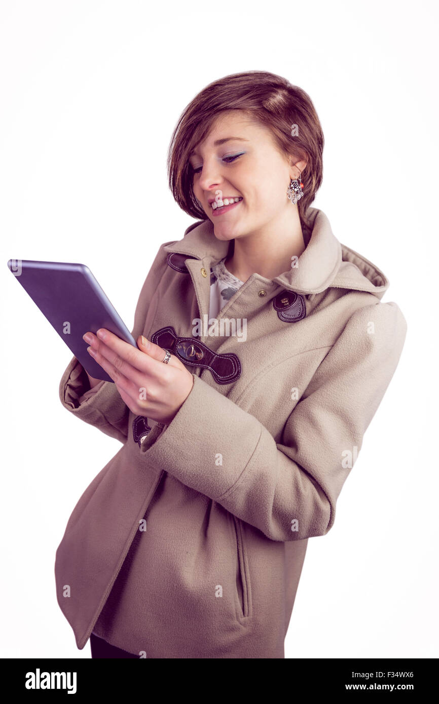 Attractive woman using her tablet pc Stock Photo - Alamy