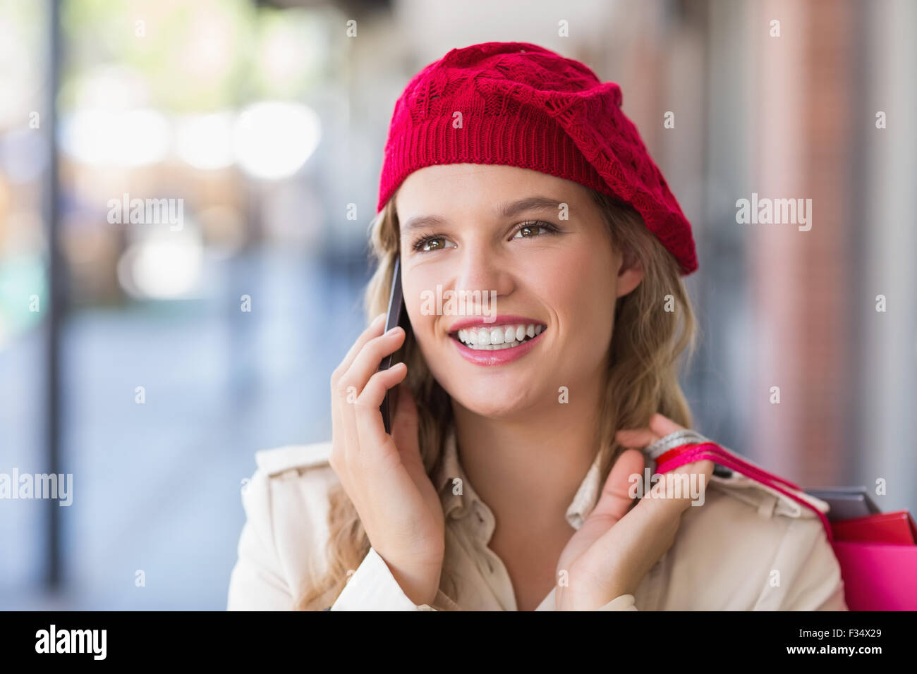 A happy smiling woman calling Stock Photo - Alamy
