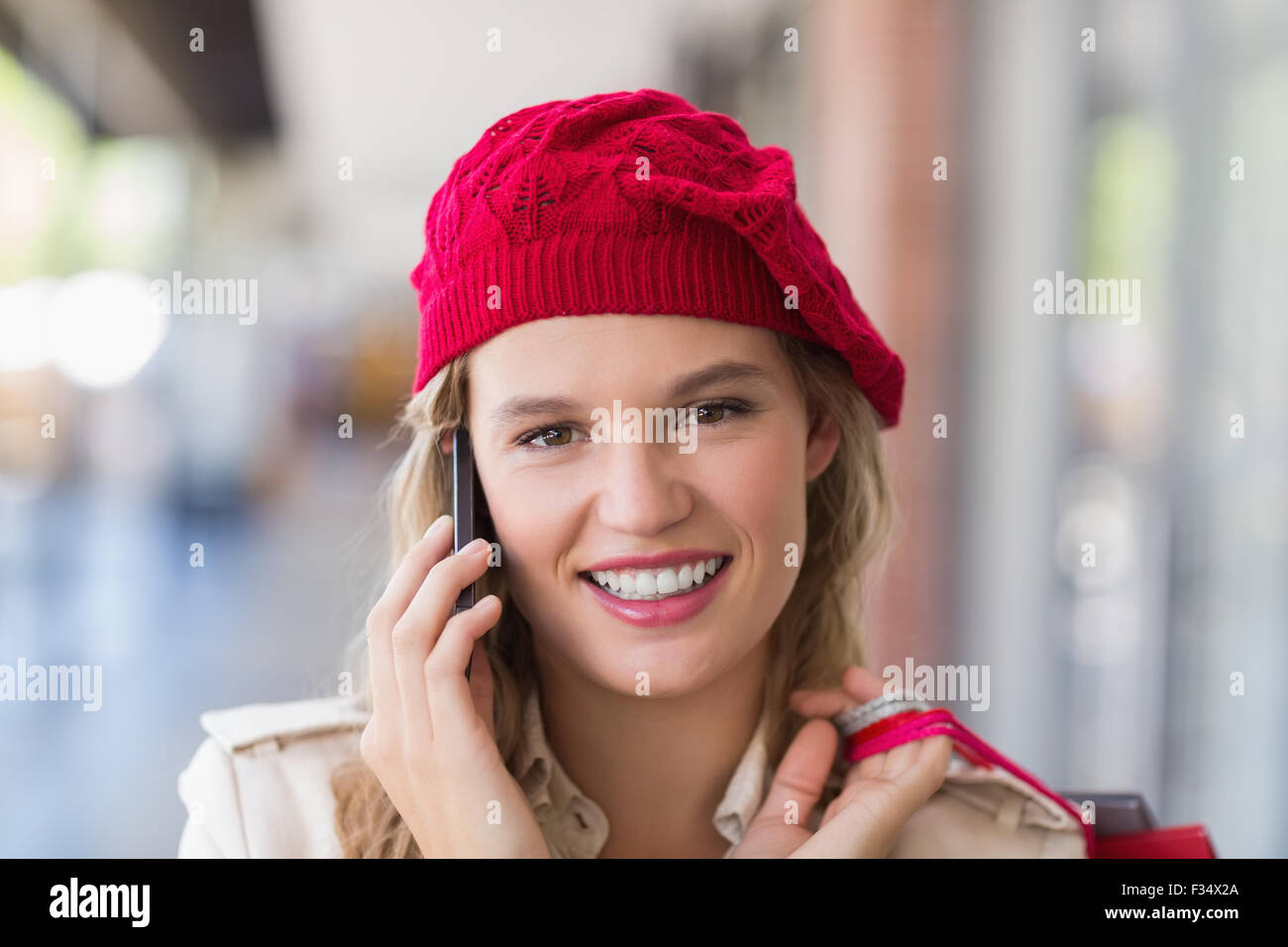 A happy smiling woman calling Stock Photo - Alamy