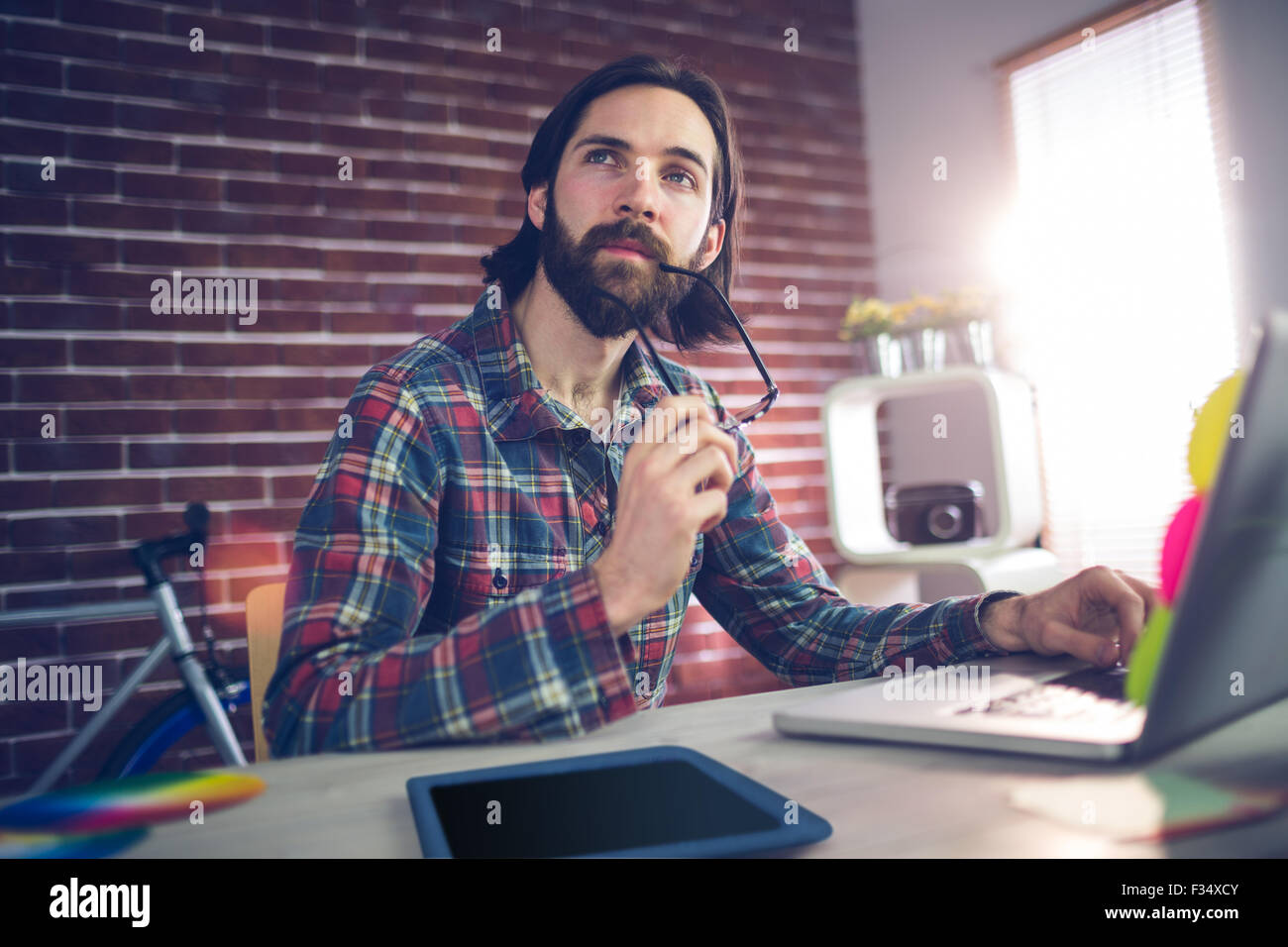 Creative businessman working in office Stock Photo - Alamy