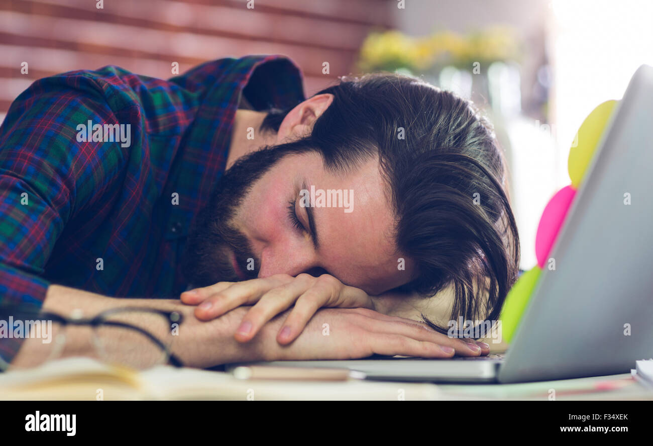 Tired creative editor sleeping Stock Photo - Alamy