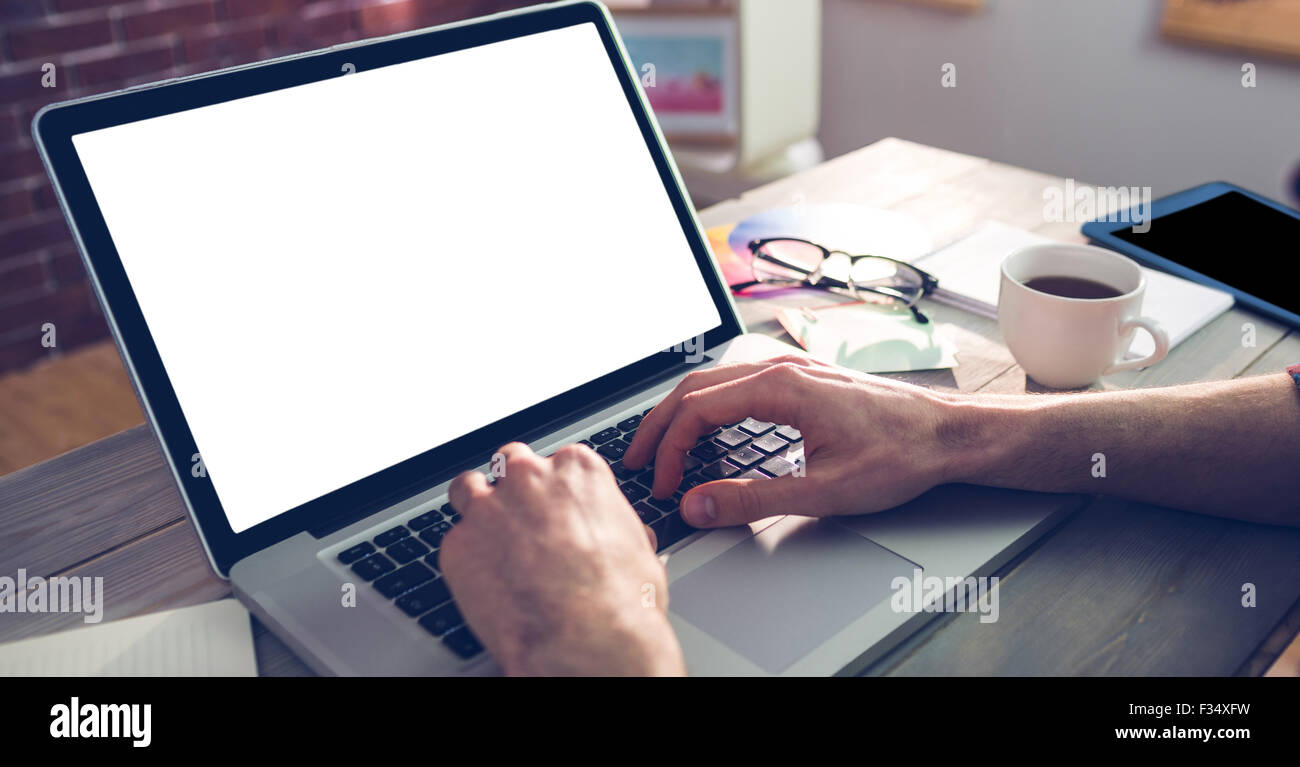 Cropped hand of graphic designer using laptop Stock Photo - Alamy