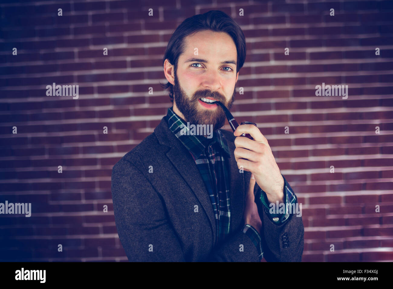 Portrait of man smoking pipe Stock Photo - Alamy