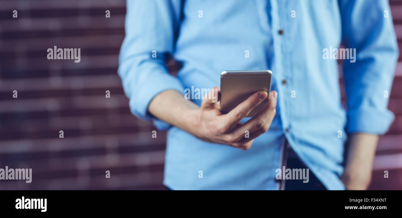 Man holding brick hi-res stock photography and images - Alamy