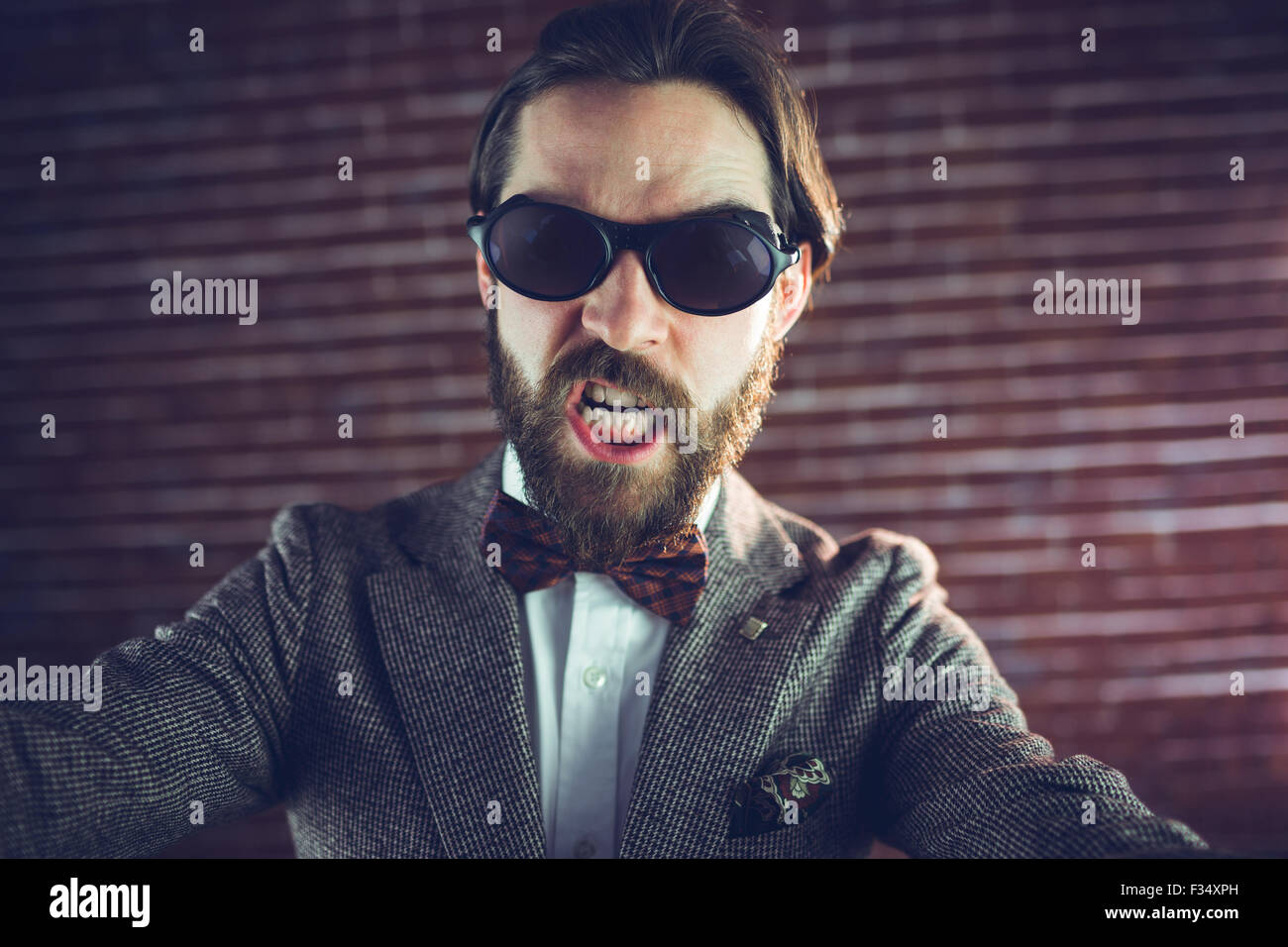 Portrait of angry fashionable man Stock Photo - Alamy