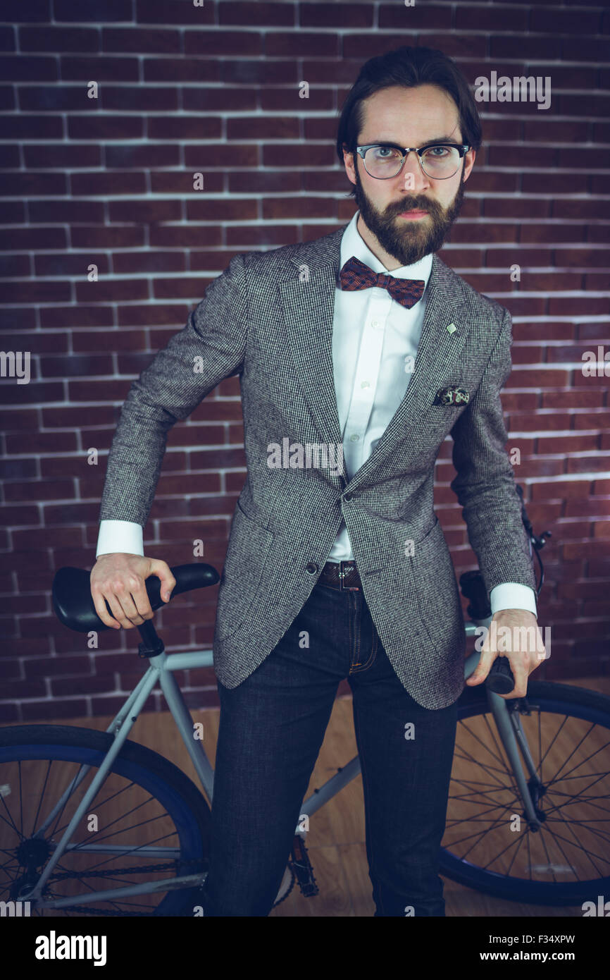 Portrait of smart man with bicycle Stock Photo - Alamy