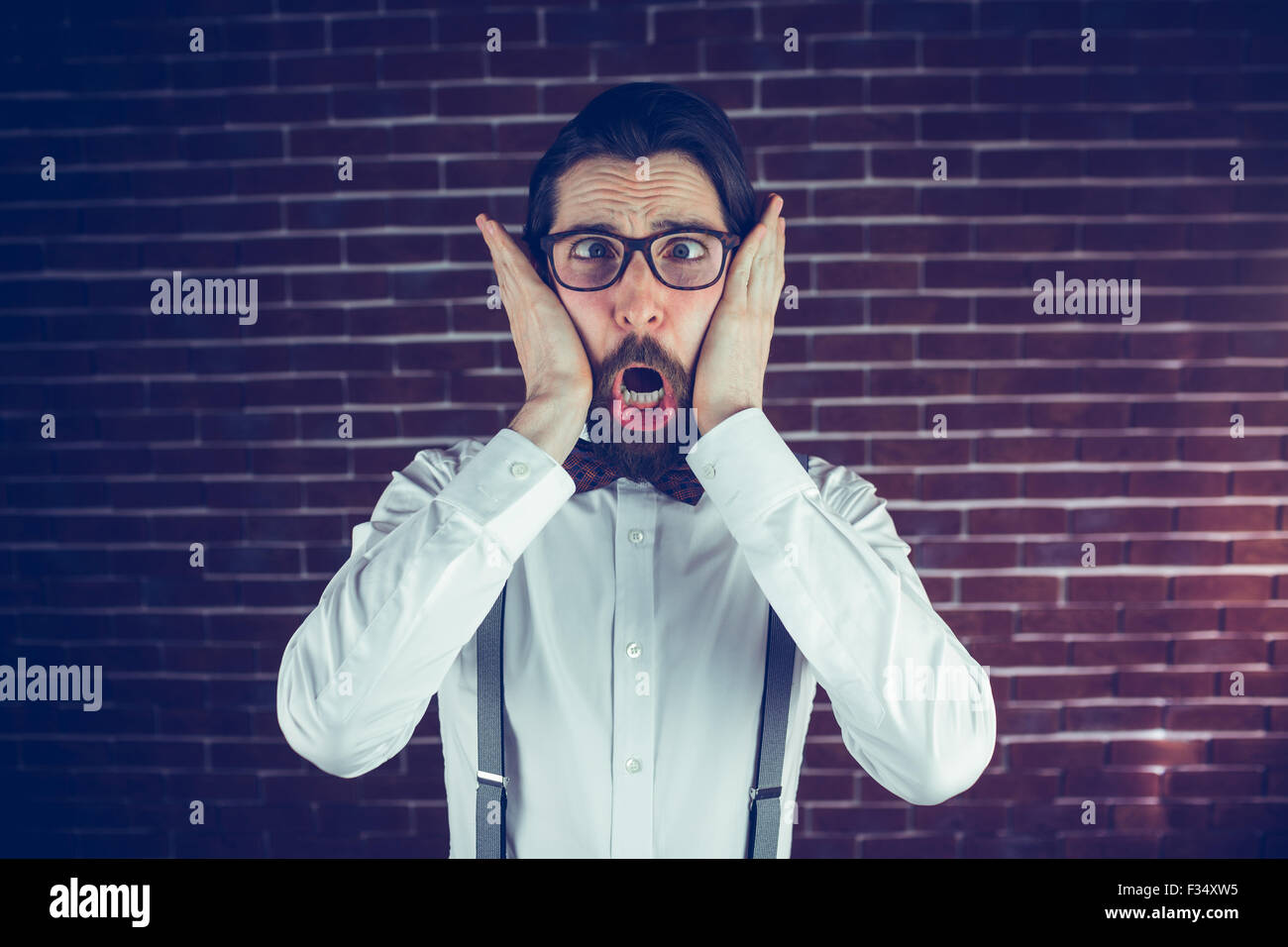 Portrait of shocked hipster Stock Photo - Alamy