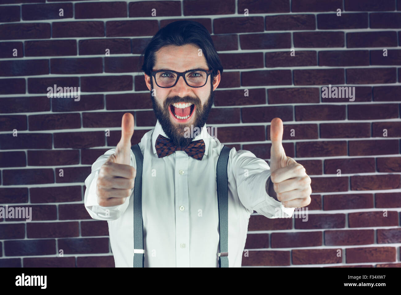 Portrait of happy man with thumbs up gesture Stock Photo - Alamy