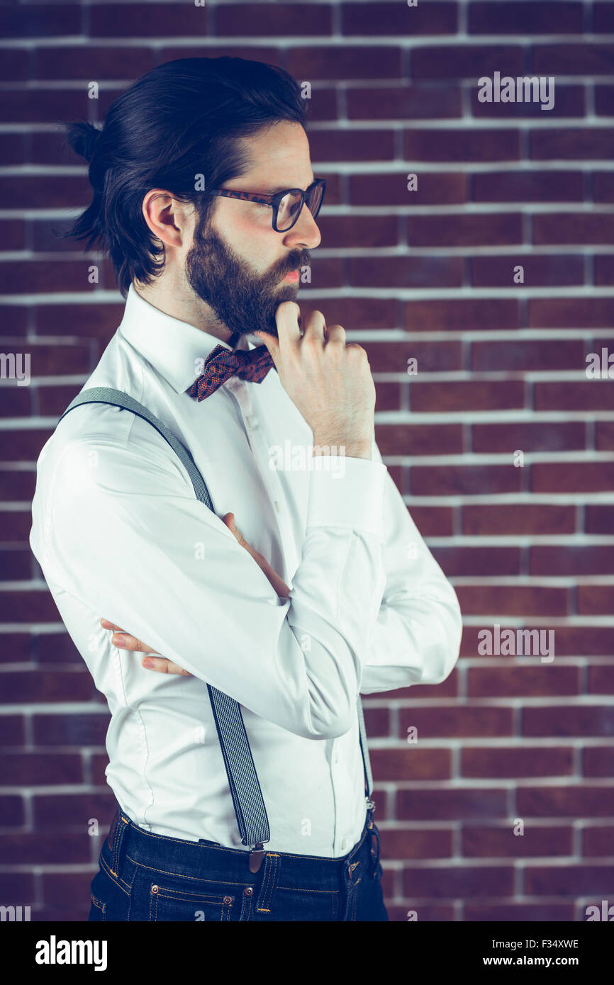Side view of thoughtful man with hand on chin Stock Photo - Alamy