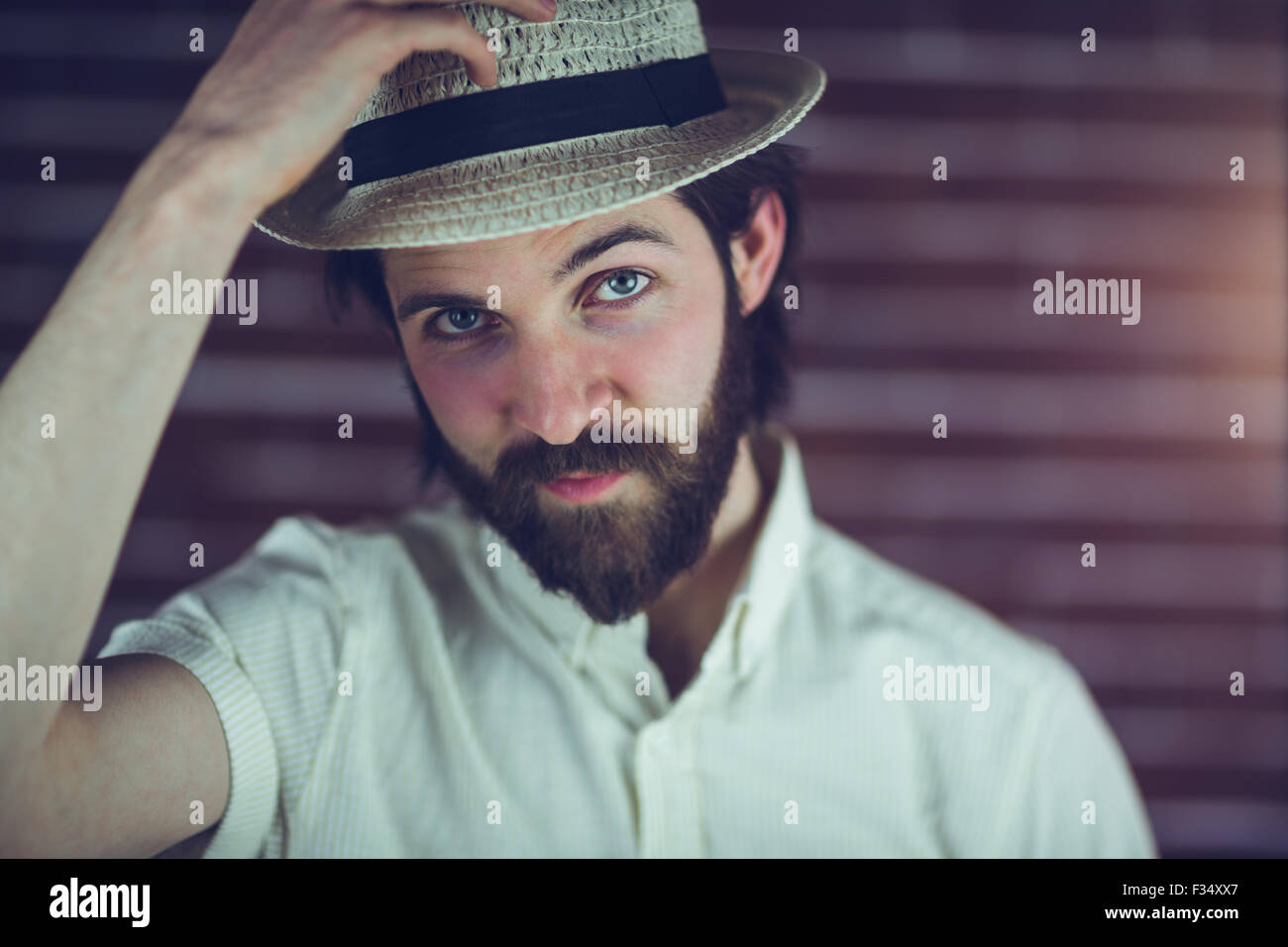 Portrait of handsome man wearing hat Stock Photo - Alamy