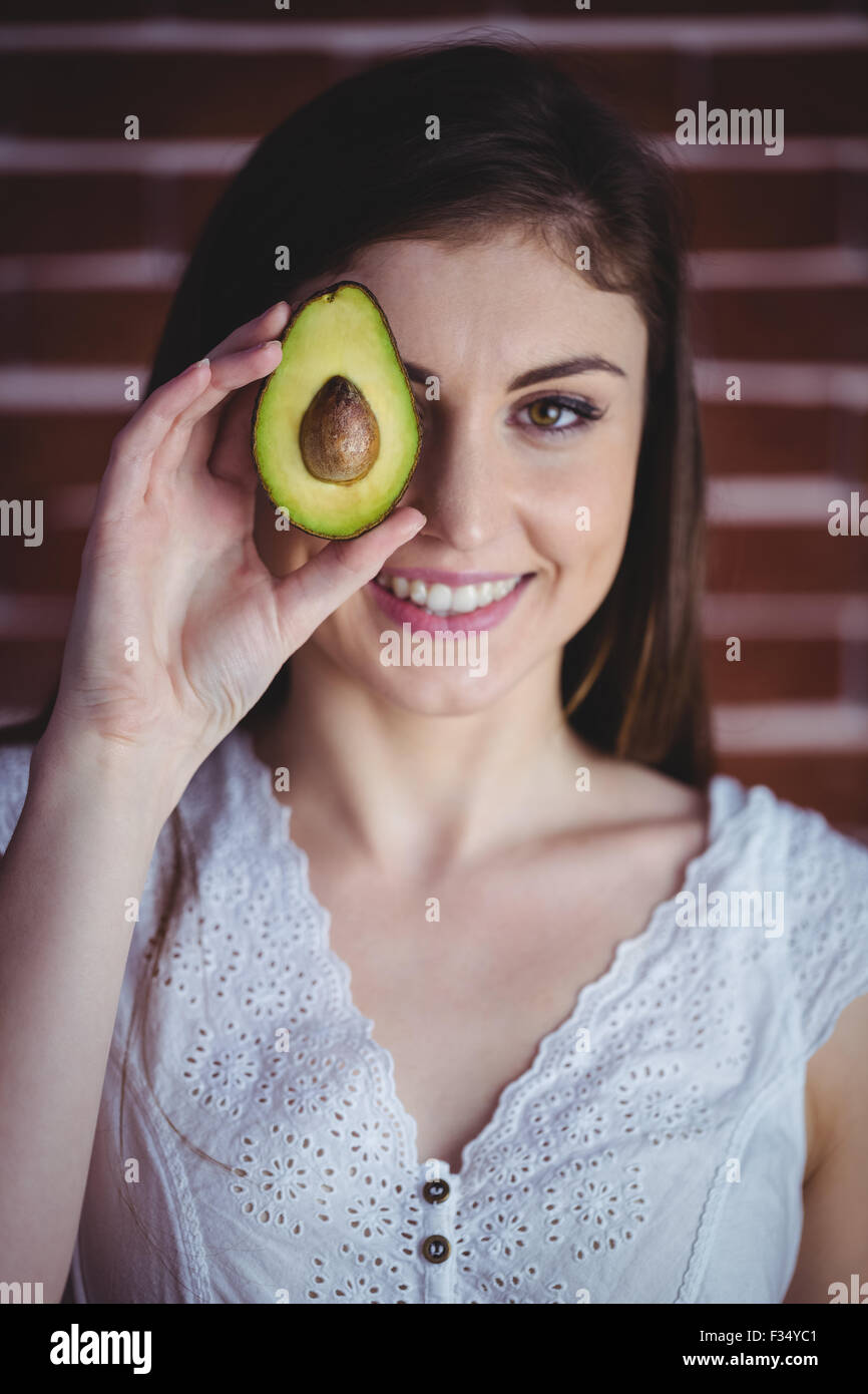 Female hands holding avocado hi-res stock photography and images - Alamy