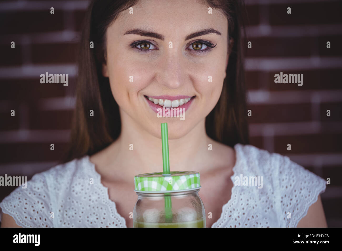 Woman sipping straw hi-res stock photography and images - Alamy