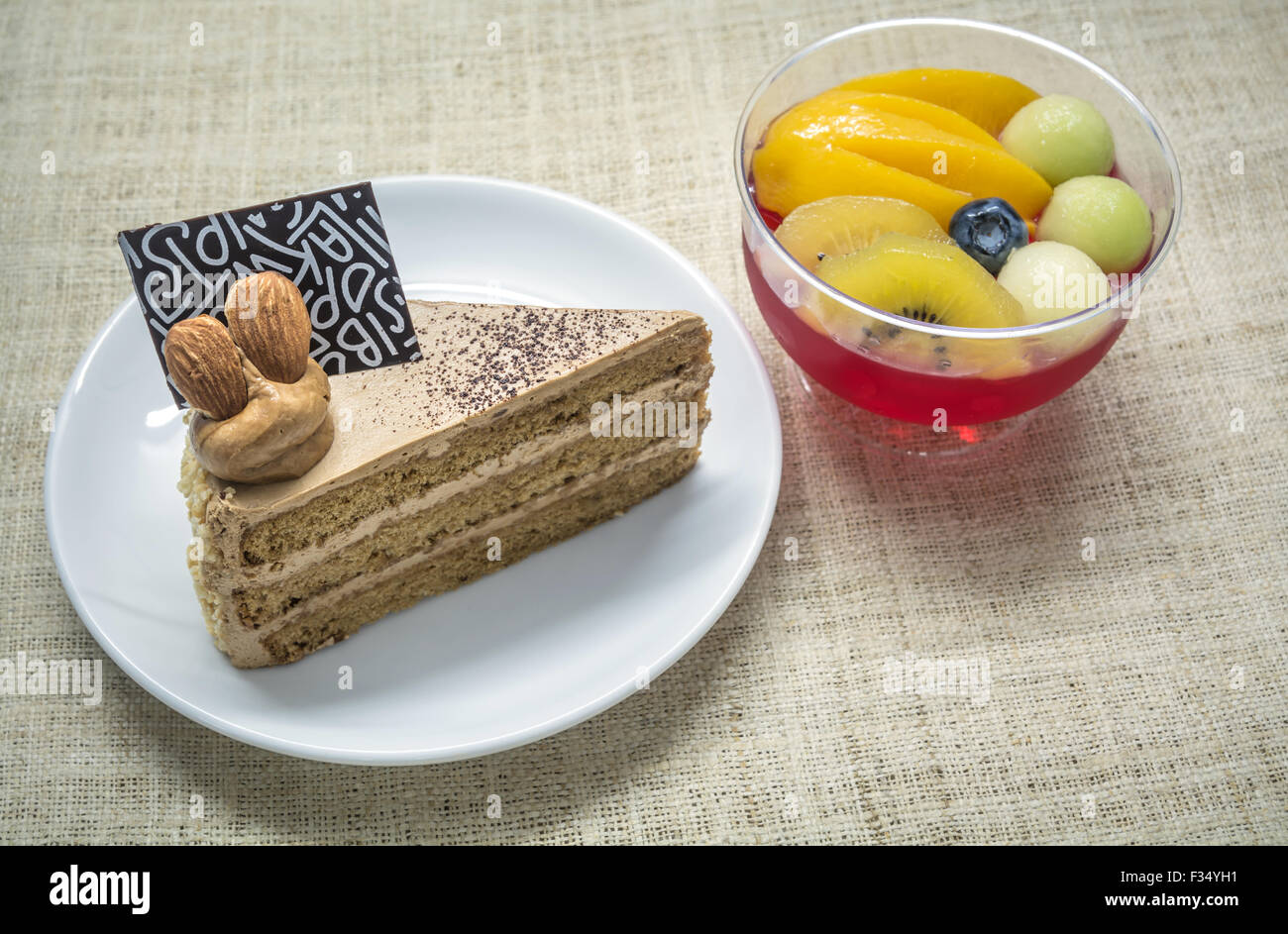 a portion of coffee cake and fruit jelly Stock Photo - Alamy