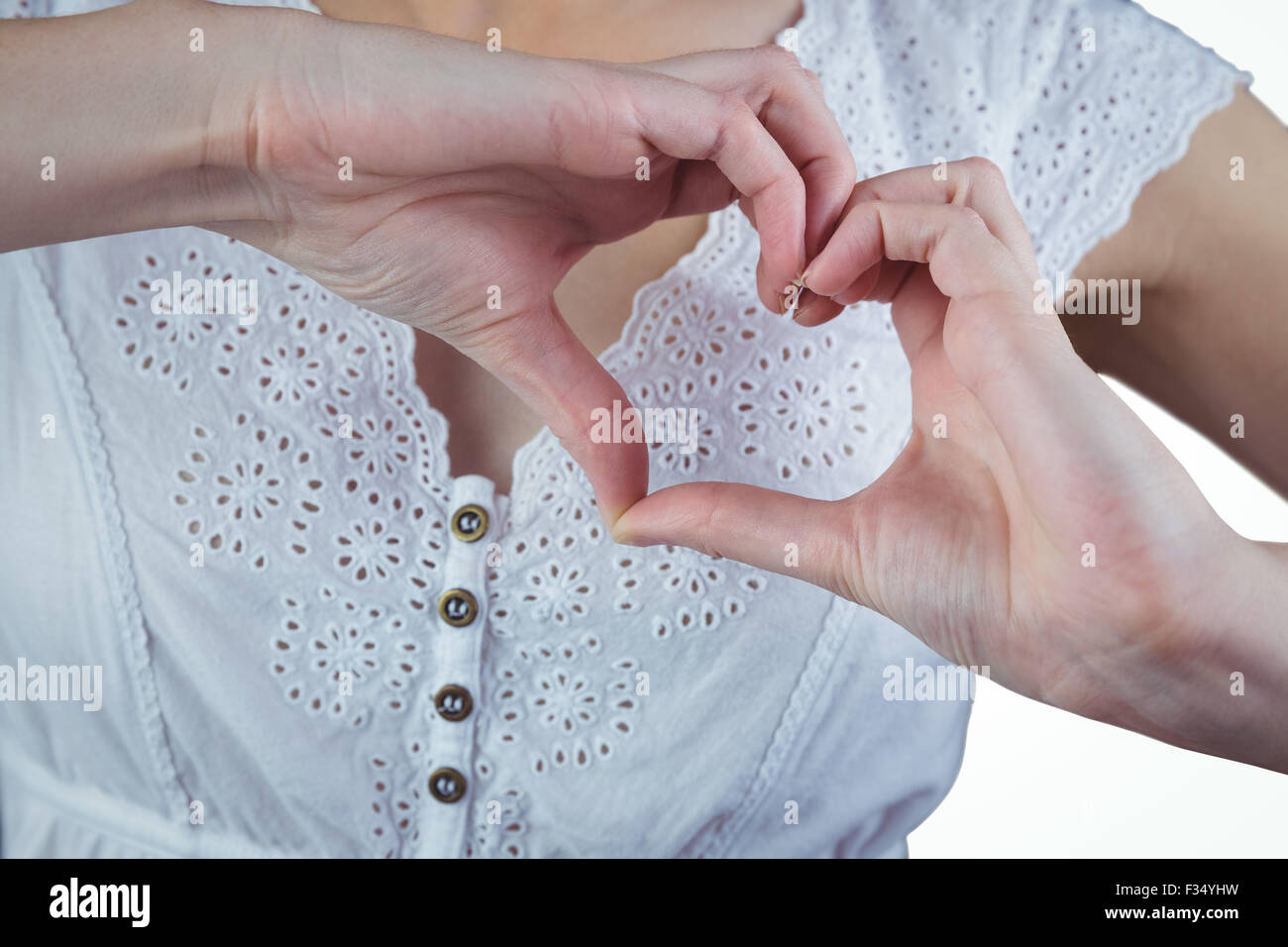 Beautiful young woman making heart hi-res stock photography and images ...