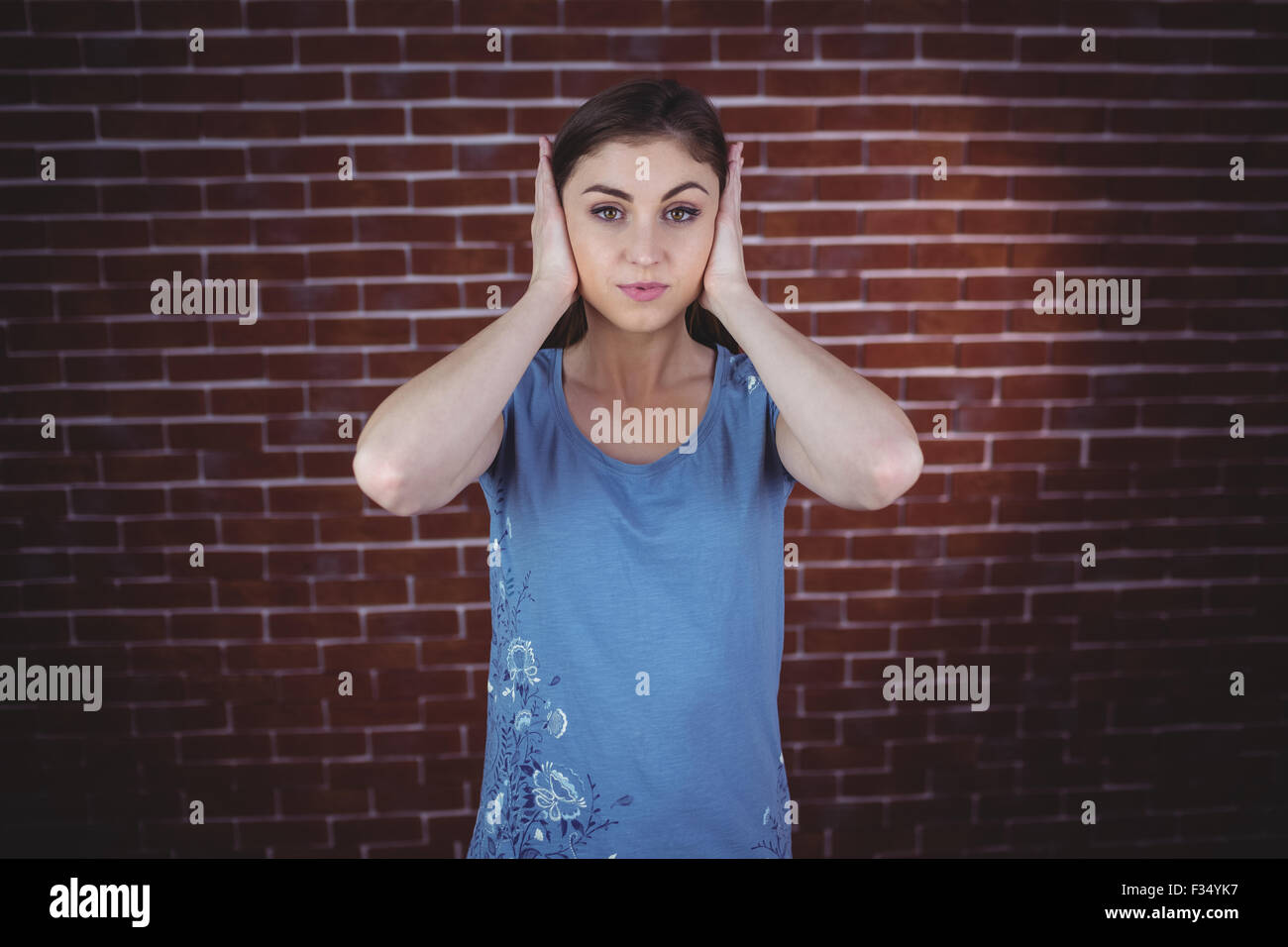 Hands over her ears hi-res stock photography and images - Alamy