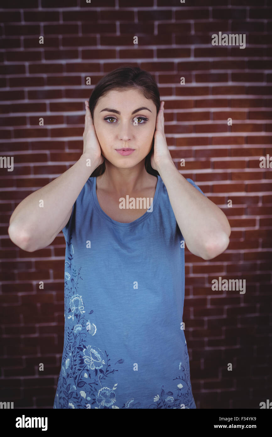 Hands over ears hi-res stock photography and images - Alamy